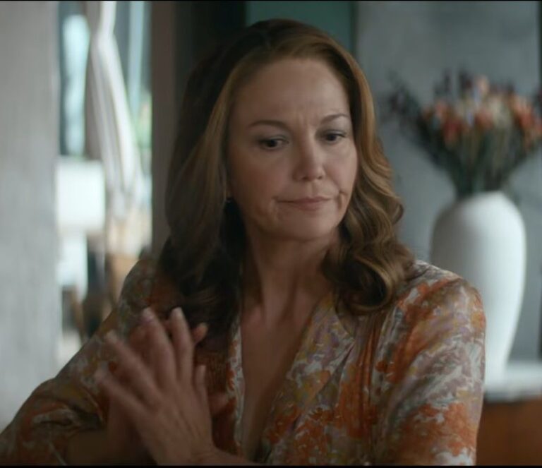 Vince Wrap Flo­ral-Print Blouse In Brown worn by Martha Cro­ker (Di­ane ...